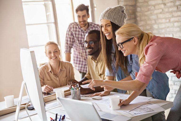 Group of designers working together - Caraniche